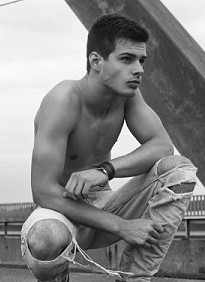 Pretty fashion model guy with a kitten look from Croatia.